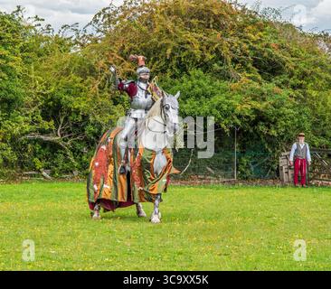 A Knight on his steed enters the jousting arena Stock Photo - Alamy