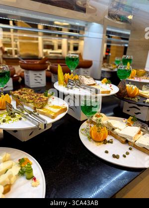 Elegant Display of Various Cheese Types and Gourmet Jelly on a Wooden ...