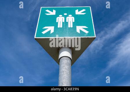 standardized pictogram for a fire safety assembly point Stock Photo - Alamy