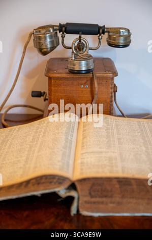 Communication progress, old wooden French rotary dial telephone and ...