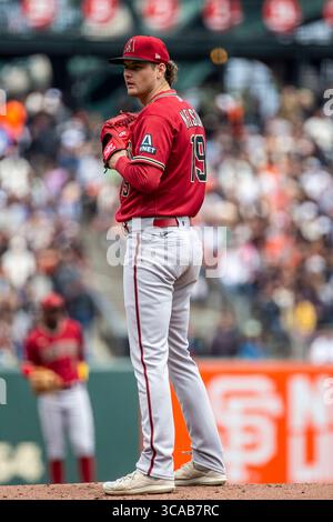 Arizona Diamondbacks starting pitcher Ryne Nelson warms up prior to a baseball game against the ...