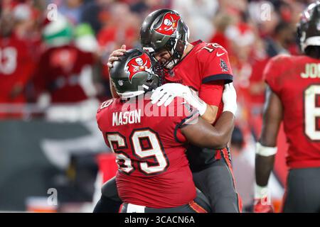 Tampa Bay Buccaneers guard Shaq Mason (69) sits on the bench during a ...