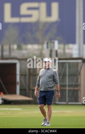 LSU head coach Brian Kelly greets quarterback Jayden Daniels, who ...