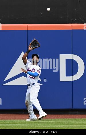 New York Mets outfielder Cedric Mullins catches a fly ball for the out ...