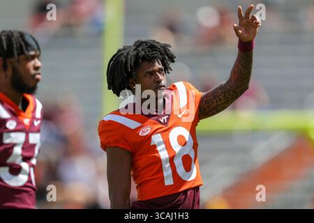 Virginia Tech quarterback William Watson III (5) runs the ball for a ...