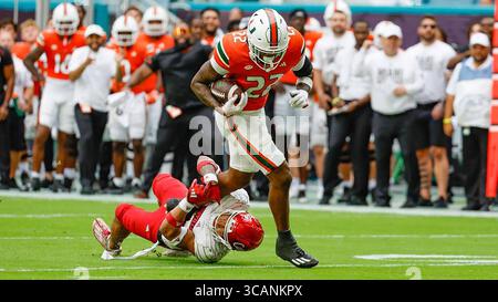 Miami running back Mark Fletcher Jr. (4) scores a touchdown during the ...