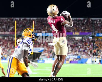 Florida State wide receiver Duce Robinson (0) receives the ball runs ...