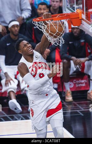 Toronto Raptors' RJ Barrett (9) dunks as Cleveland Cavaliers' Dean Wade ...