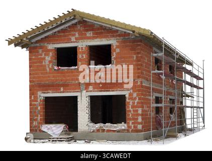 Unfinished building of a red brick rural house. Isolated on white Stock ...