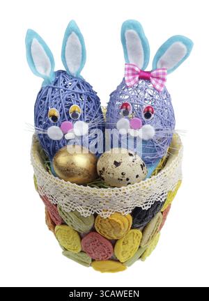 Easter bunnies handmade from colored paper, easy crafts for kids on a ...