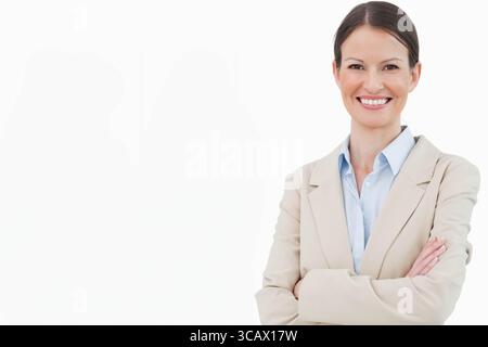 Businesswoman wearing blue blazer standing near office building Stock ...