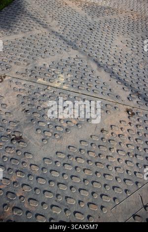 metal sheeting mat laid on grass to give heavy machines traction Stock ...
