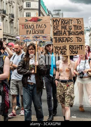 People marching with protest signs at the 'No Kings Protest' in Denver ...