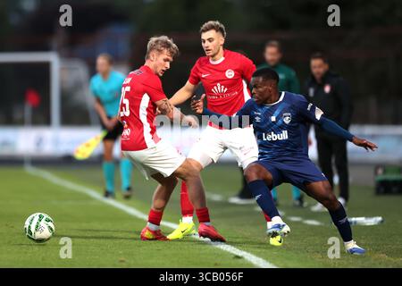 Santa Clara's Brenner (right) battles for the ball with Larne's Dylan ...