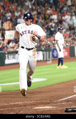 Houston Astros' Jake Meyers scores on a hit by Jeremy Peña during the ...