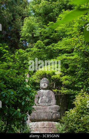 Stone sculpture of Buddha on the grounds of Ryōan-ji Buddhist temple ...
