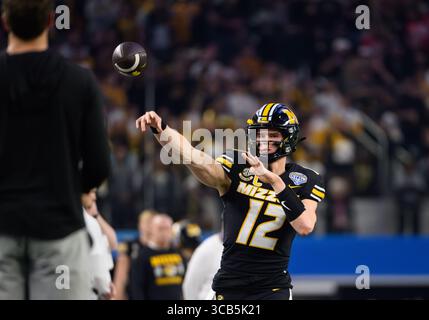 Missouri quarterback Brady Cook warms up before the start of an NCAA ...