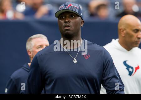 Houston Texans quarterbacks coach Jerrod Johnson walks on the field ...