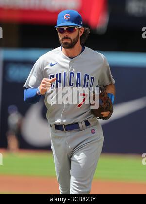 Chicago Cubs shortstop Dansby Swanson throws out Milwaukee Brewers' Sal ...