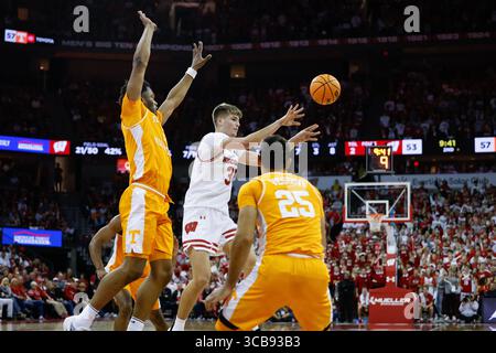Wisconsin forward Nolan Winter passes the ball during warmups before an ...