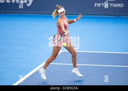 Katie Boulter, of Great Britain returns a backhand shot to Moyuka ...