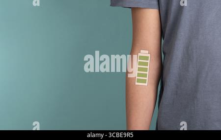 Arm with full loaded battery, positive thinking and mental health ...