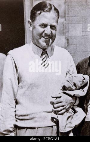 Ernie Els, from South Africa, chews on a tee as he gets set to tee off ...