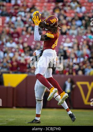 Washington Commanders wide receiver Cam Sims (89) runs during an NFL ...