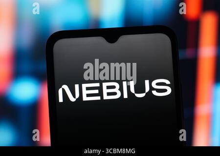 In this photo illustration, a Nebius logo is seen on a smartphone and ...
