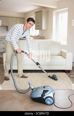 Detail shot of a beige leather couch in a living room Stock Photo - Alamy