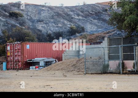 A fire truck sits near damage after a train derailed on Wednesday, June ...