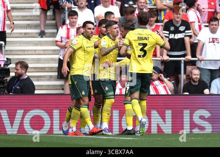 Wrexham's Josh Windass celebrates scoring their side's third goal of ...