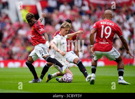 Manchester United's Bryan Mbeumo (right) and Nottingham Forest's Neco ...