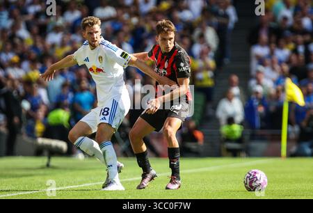 Leeds United's Anton Stach (left) and Bournemouth's Amine Adli, during ...