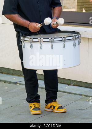 Close-up of a snare drum, percussion instrument on a dark background ...