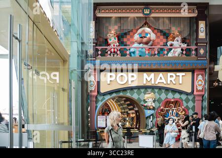 Bangkok, Thailand. 9th Aug, 2025. Shoppers with POP MART bags seen at a ...