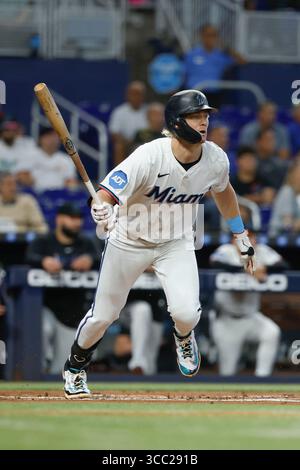 Miami Marlins' Kyle Stowers hits a pitch during a baseball game against ...