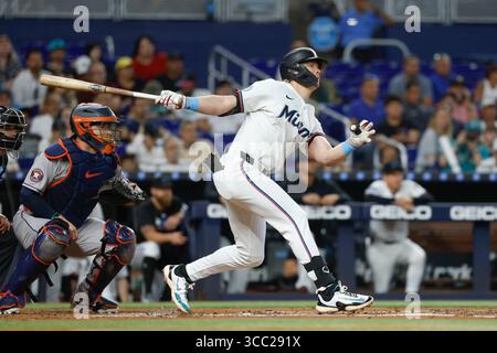 Miami Marlins' Kyle Stowers hits a pitch during a baseball game against ...