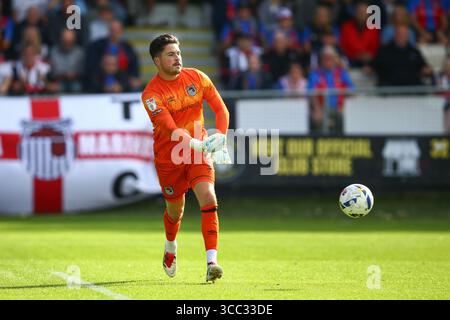 Grimsby Town goalkeeper Christy Pym (1) celebrates saving penalty by ...