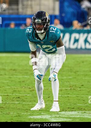 Jacksonville Jaguars' Travis Hunter (12) rus to the ball during an NFL ...
