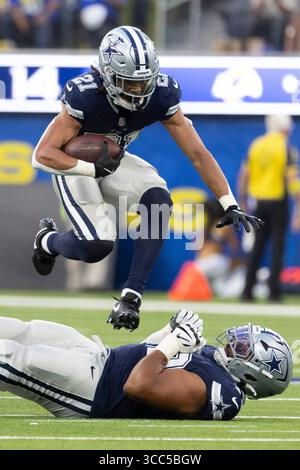 Dallas Cowboys cornerback Caelen Carson, right, fights with Minnesota ...