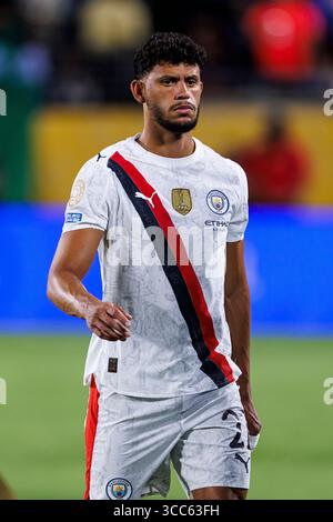 Manchester City midfielder Matheus Nunes (27) prepares to take a throw ...