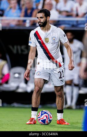 Rayan Aït-Nouri Of Manchester City inspects the pitch during the ...