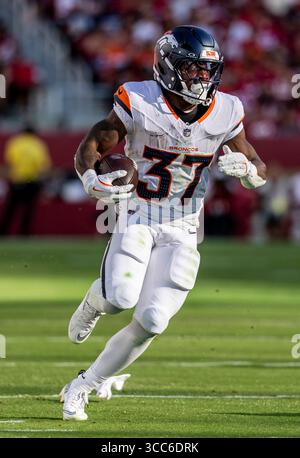 Denver Broncos running back RJ Harvey (12) celebrates his touchdown run ...