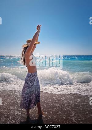 A beautiful view of a sea with foamy waves in Asia Stock Photo - Alamy