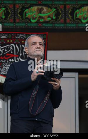 Iranian President Masoud Pezeshkian chairs a cabinet meeting in Tehran ...