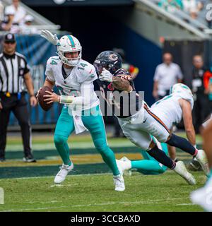 Miami Dolphins quarterback Quinn Ewers (14) throws the ball during an ...