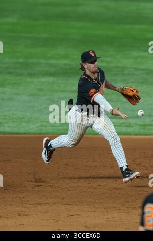 February 18, 2023: Roc Riggio #7 Oklahoma State infielder makes a throw ...