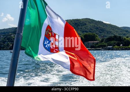 Italian National Maritime Flag Waving on Lake Como Italy. Blue water ...