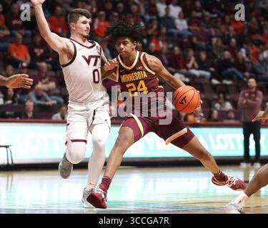 Virginia Tech Hokies guard Jaden Schutt (2) dribbles the ball at ...